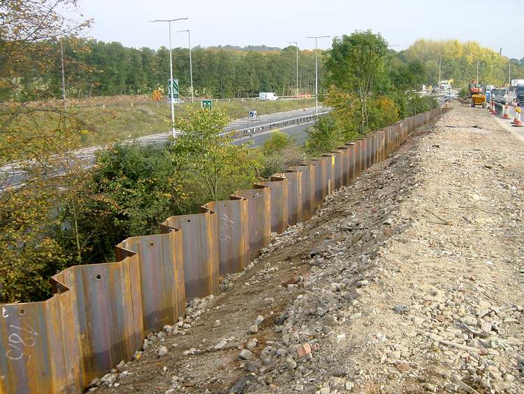 Steel sheet pile retaining wall for road widening | GIKEN LTD.
